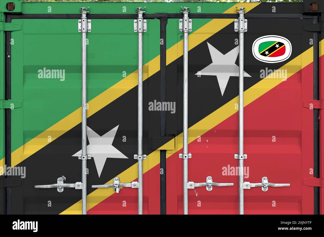 Saint Kitts and Nevis flag depicted on metal doors of shipping cargo ...