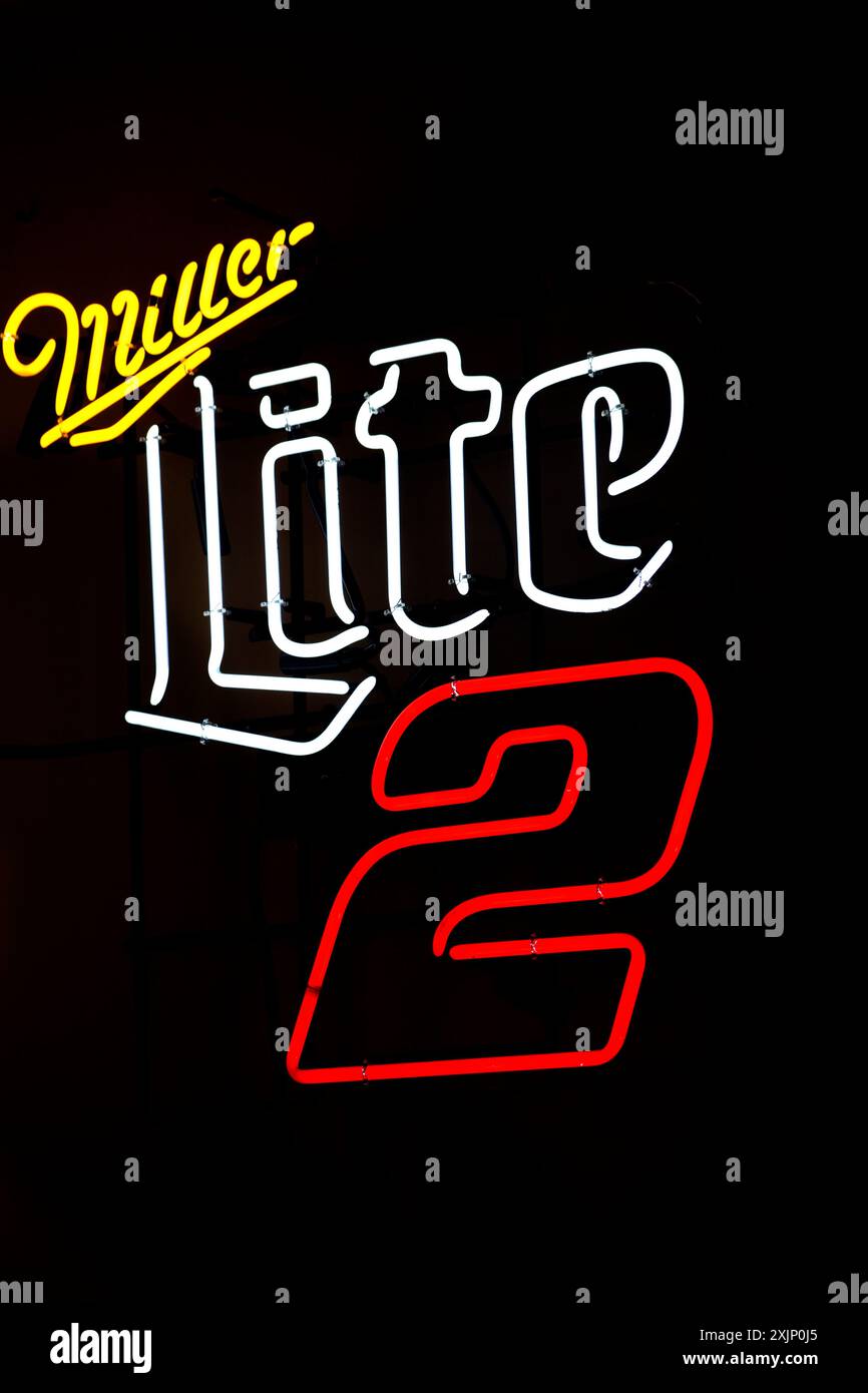 A Miller Lite beer neon sign promoting the beer and its sponsorship of ...