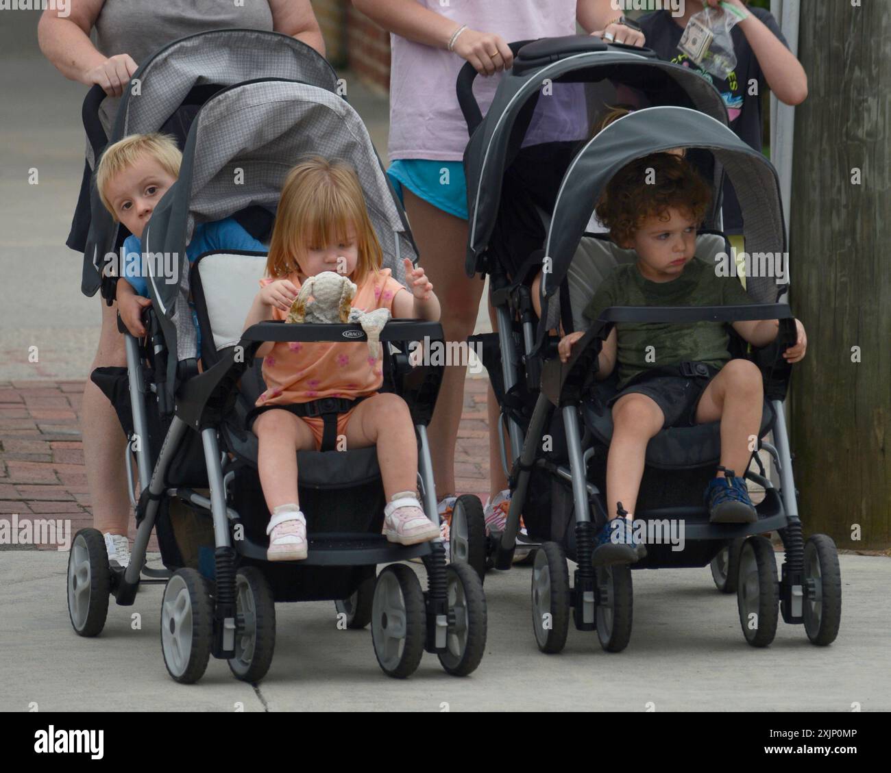 Women with child buggies hi-res stock photography and images - Alamy