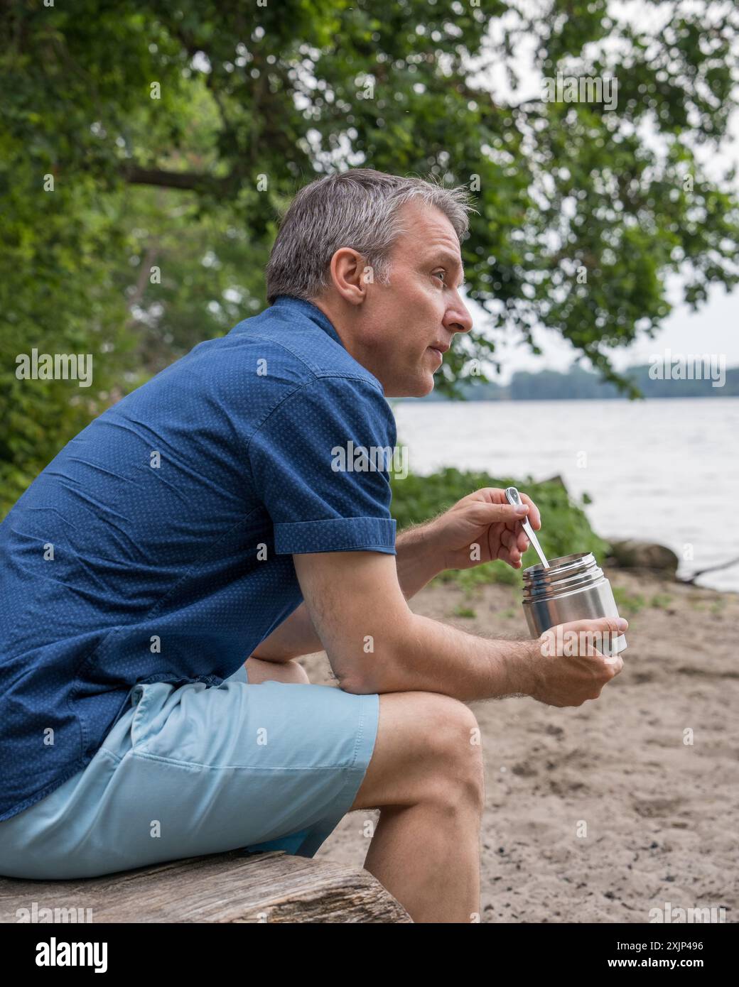 The groom puts the wedding ring on the bride at the wedding ceremony ...
