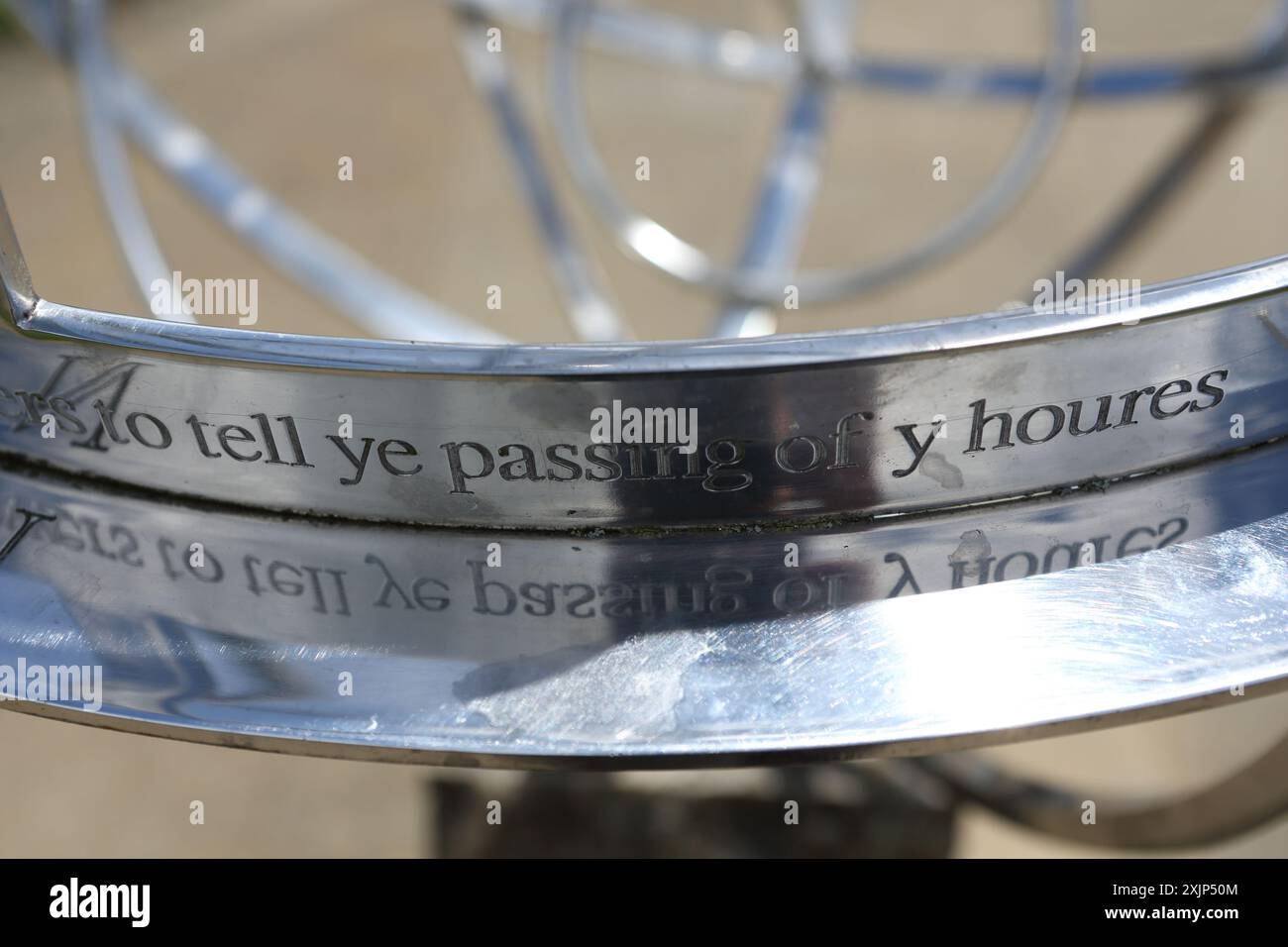 Globe sundial made of silver metal engraved with words Reigate Priory ...