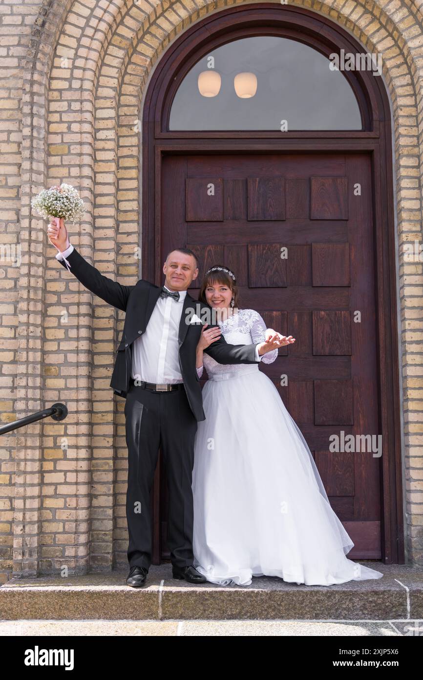 The bride and groom just got married, delight, joy, emotions. The ...