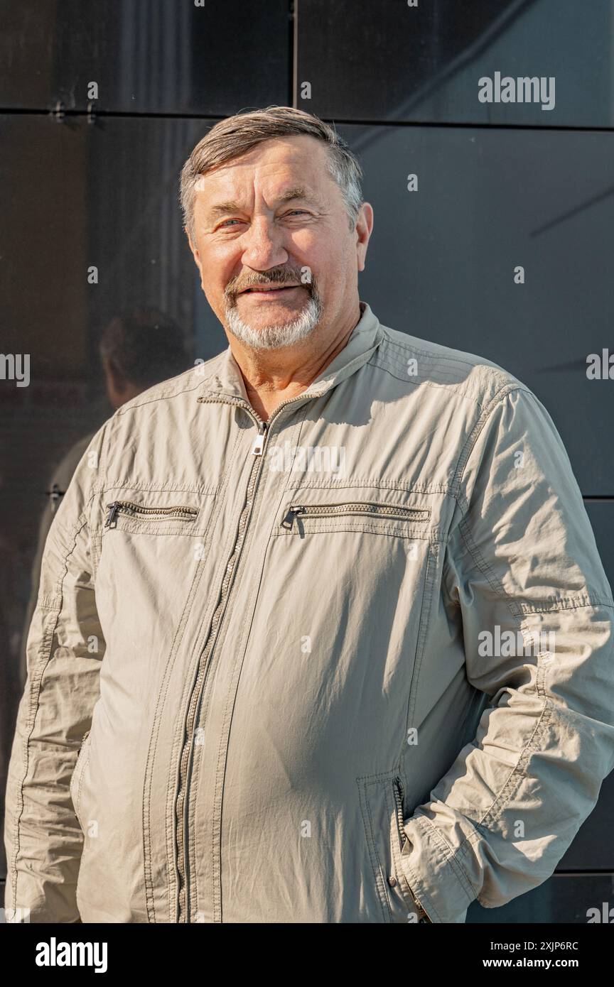 Old gray haired grandfather looks hi-res stock photography and images ...