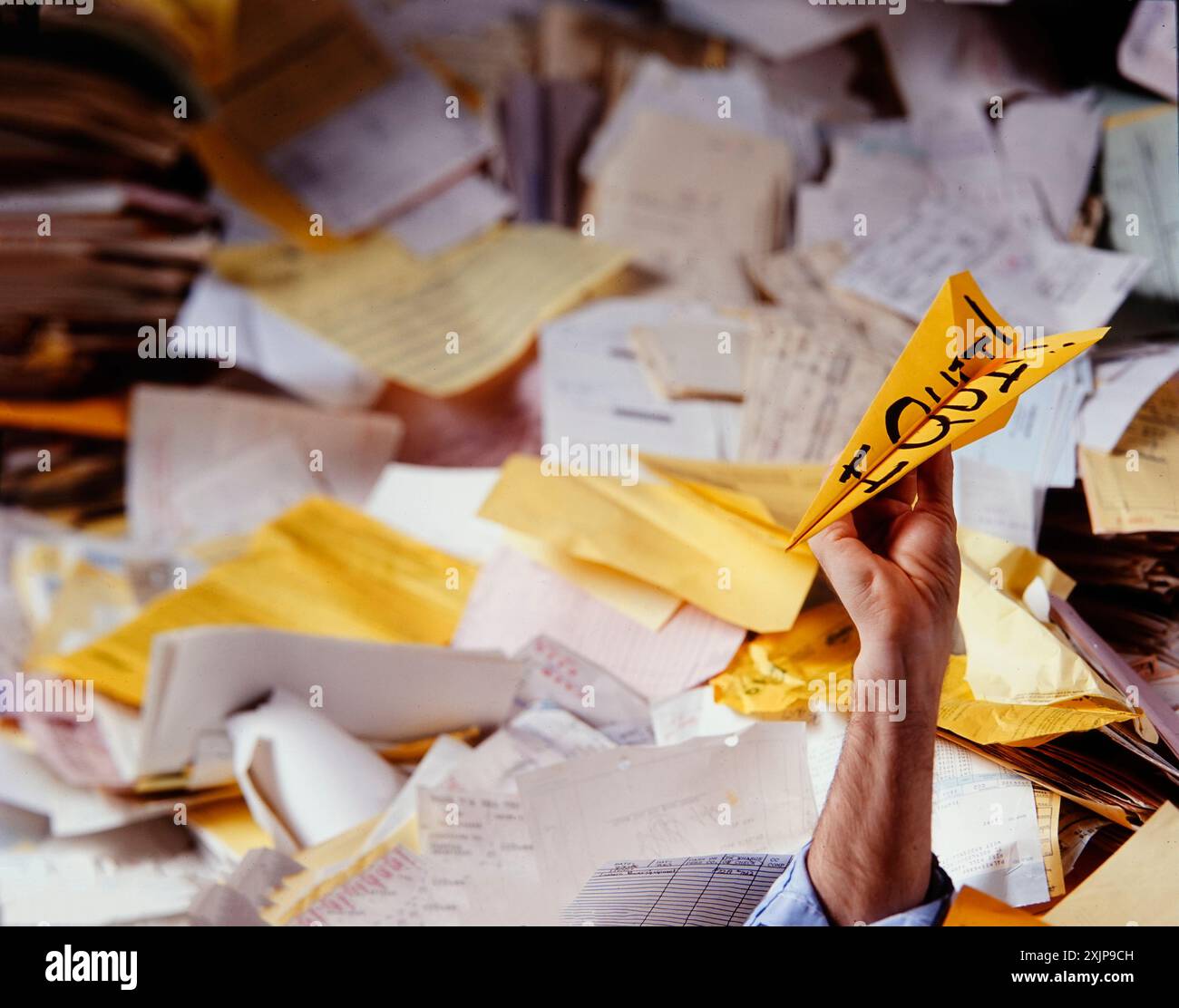 Hand on a pile of paperwork hi-res stock photography and images - Alamy