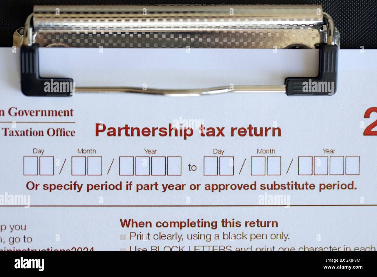 KYIV, UKRAINE - JULY 10, 2024 Australian Partnership Tax Return blank ...