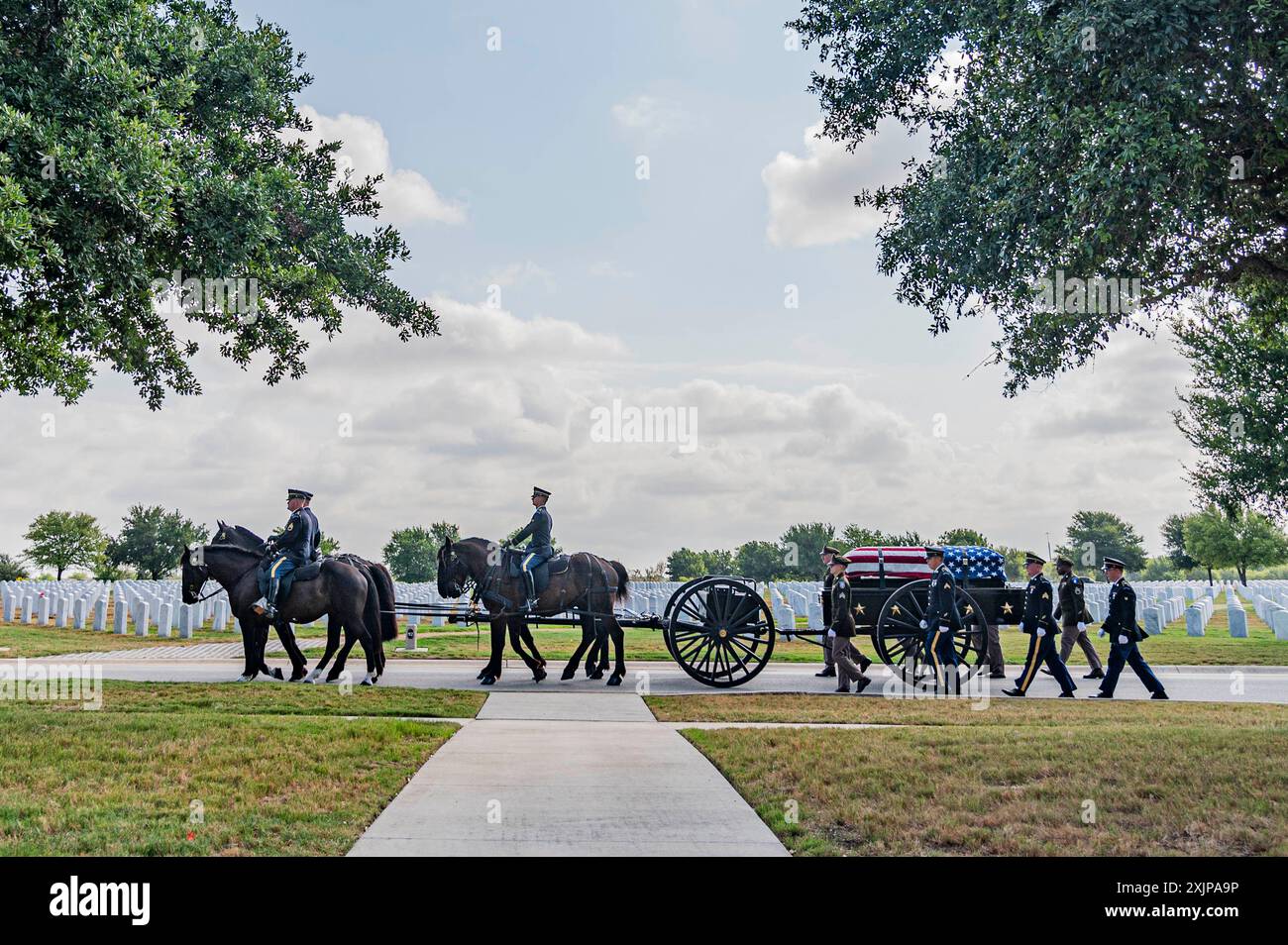 Soldiers with the Fort Sam Houston Caisson Section carry the flag ...