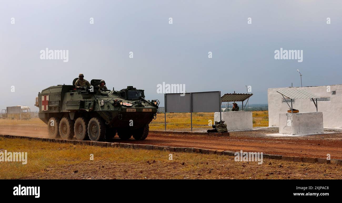 U.S. Army combat medics, assigned to 2nd Cavalry Regiment, drive their ...