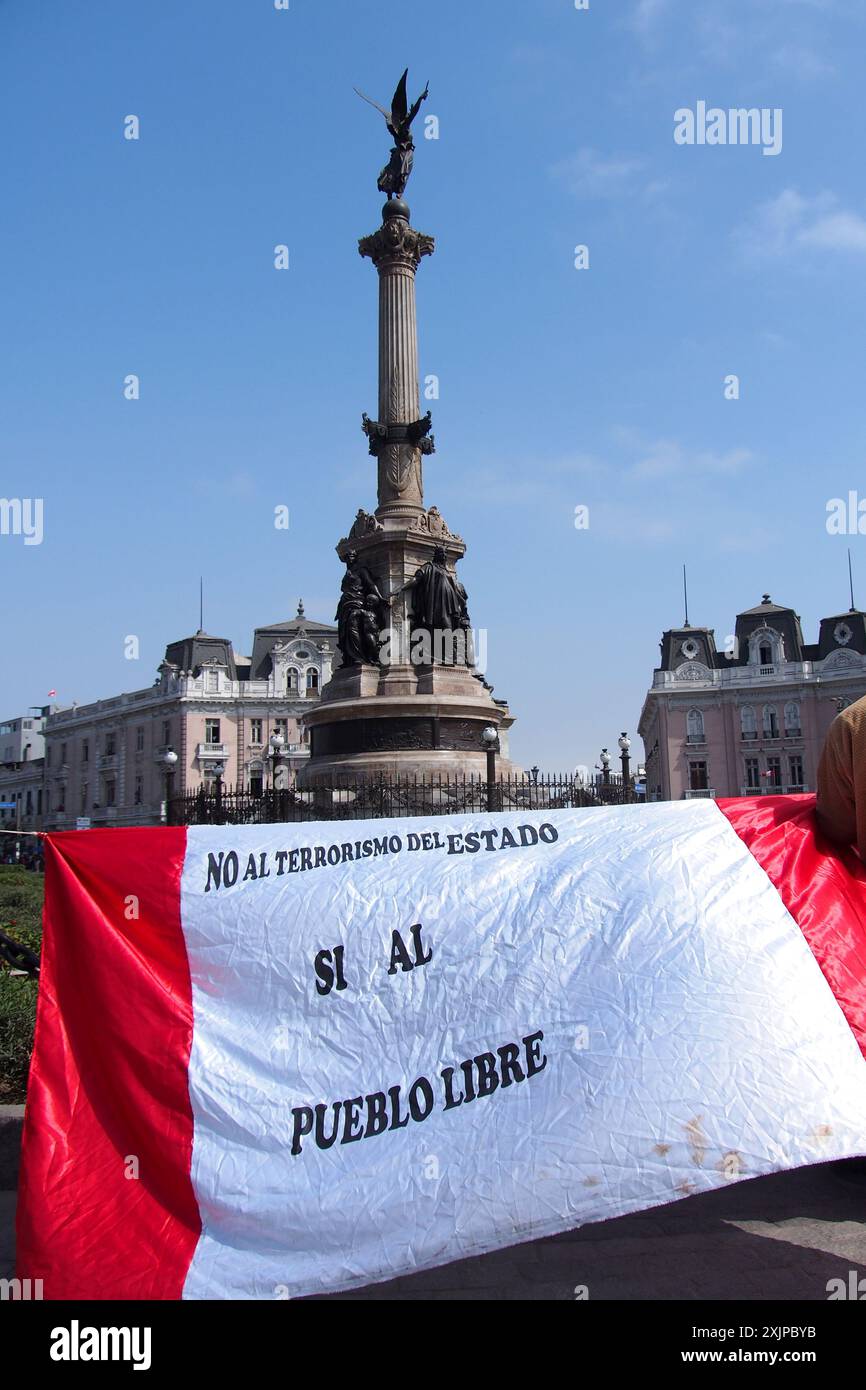 "No to State Terrorism, Yes to Free People" can be read on a Peruvian ...