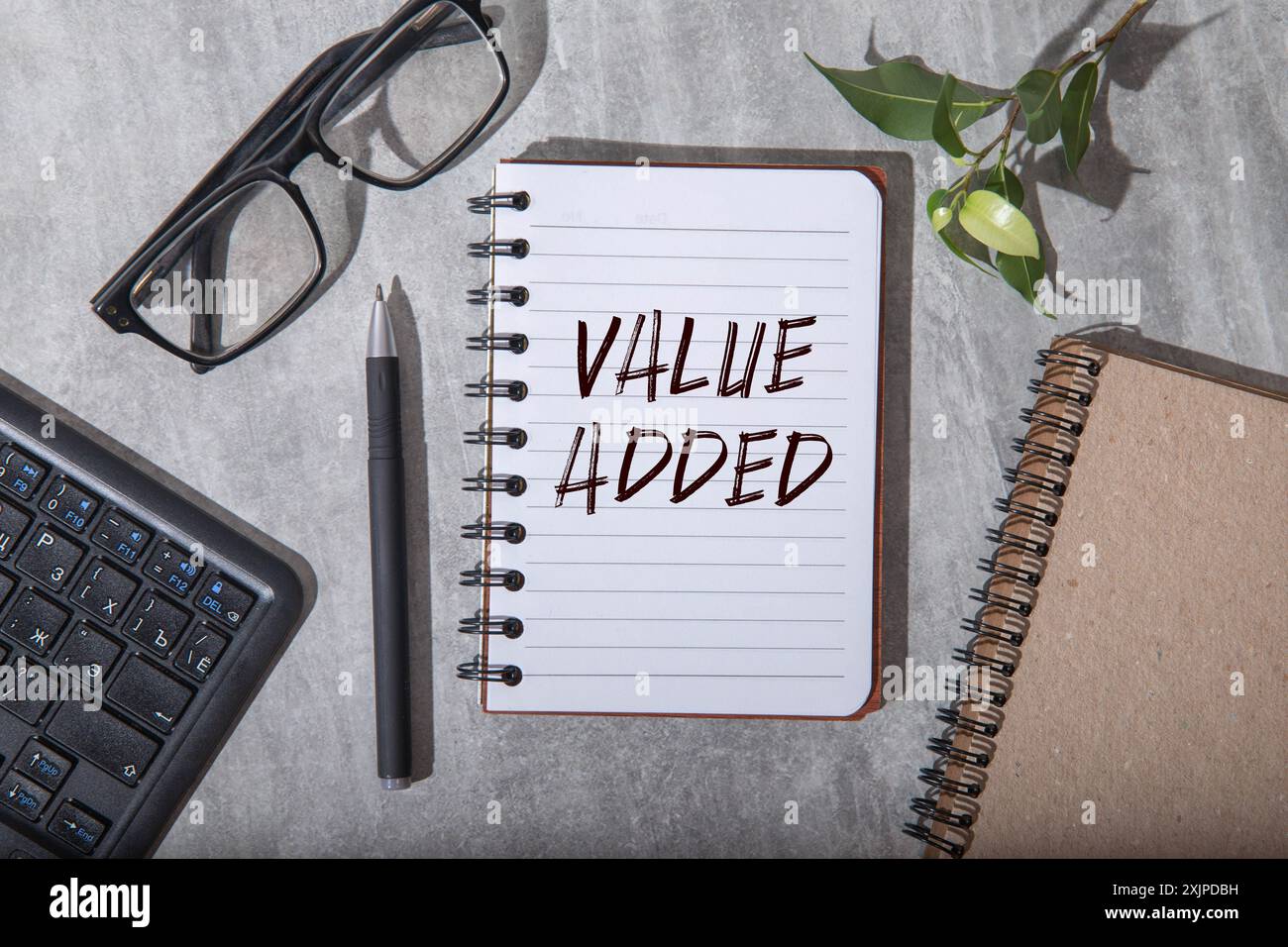 Wooden blocks with words 'Value added' Stock Photo - Alamy