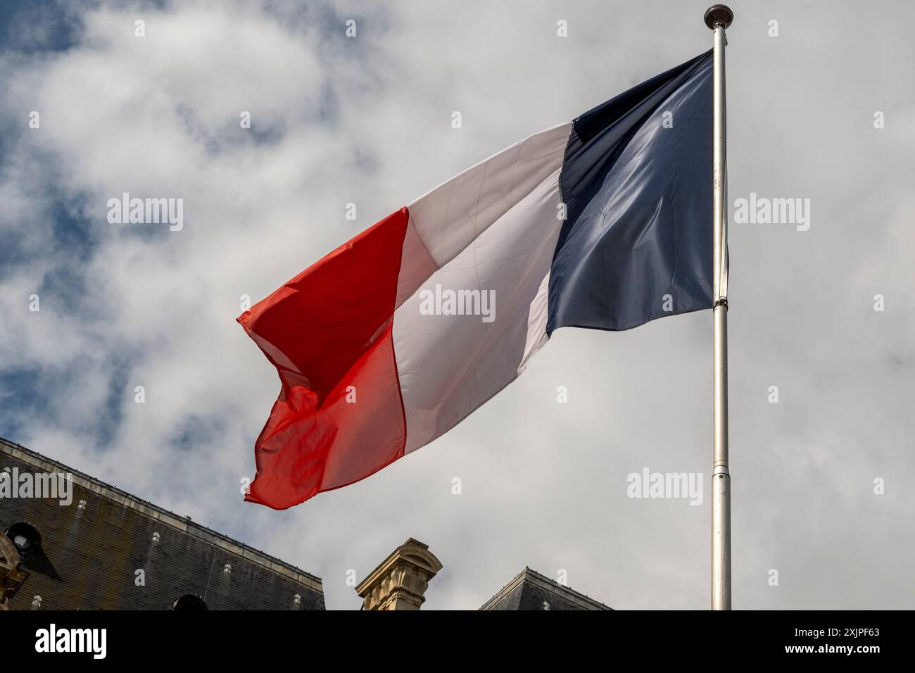 French flag fluttering in the wind with sky background Stock Photo - Alamy