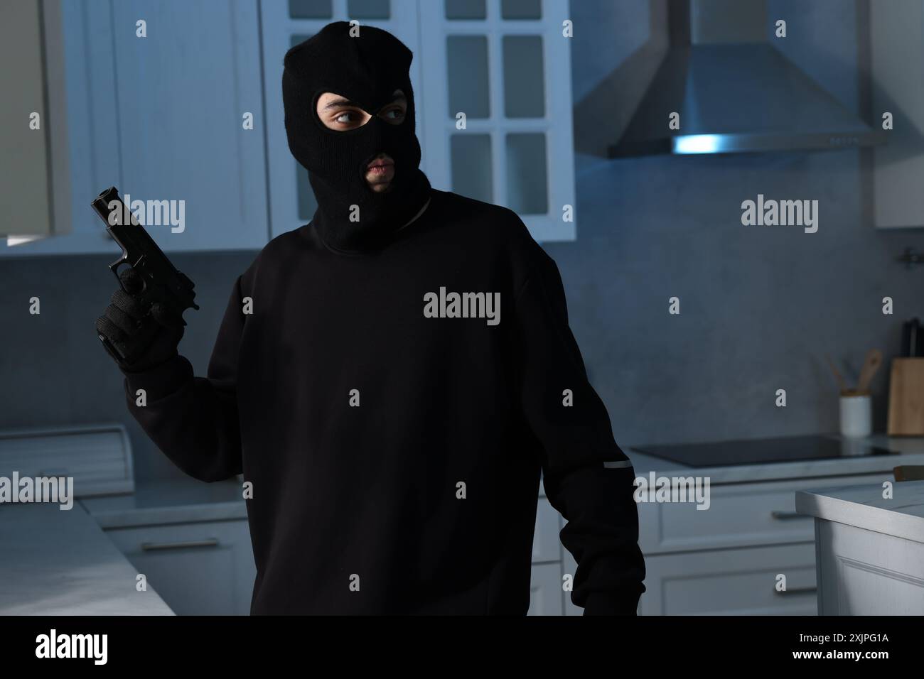 Anonymous criminal wearing black balaclava hi-res stock photography and ...