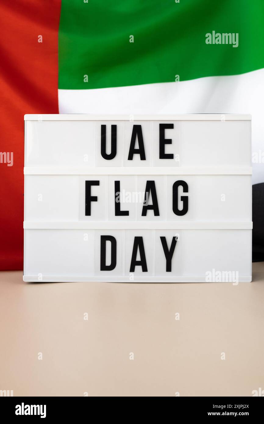 Message with text UAE FLAG DAY on United Arab Emirates waving flag made ...