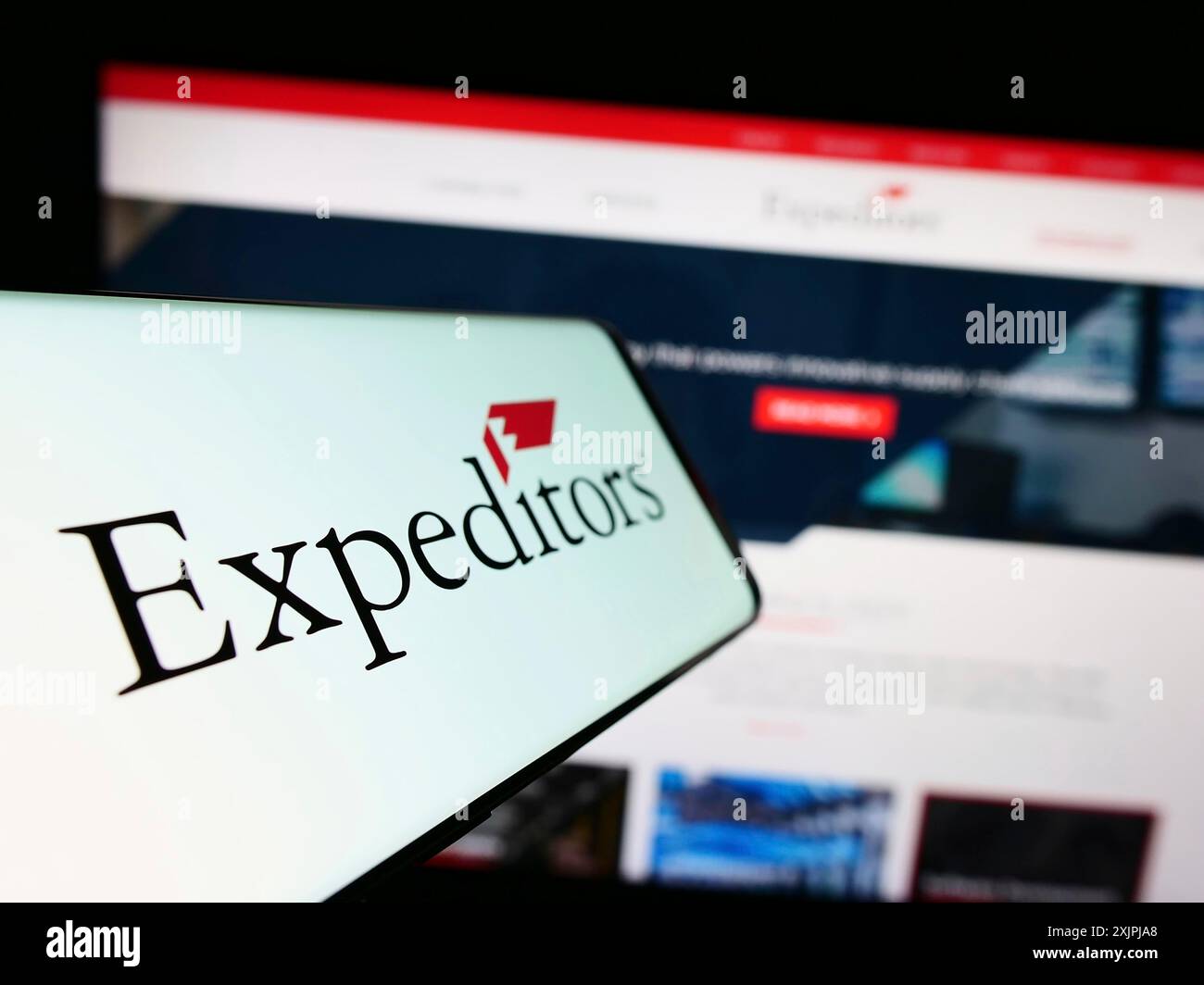 Stuttgart, Germany, 07-01-2023: Smartphone with logo of Expeditors International of Washington ...