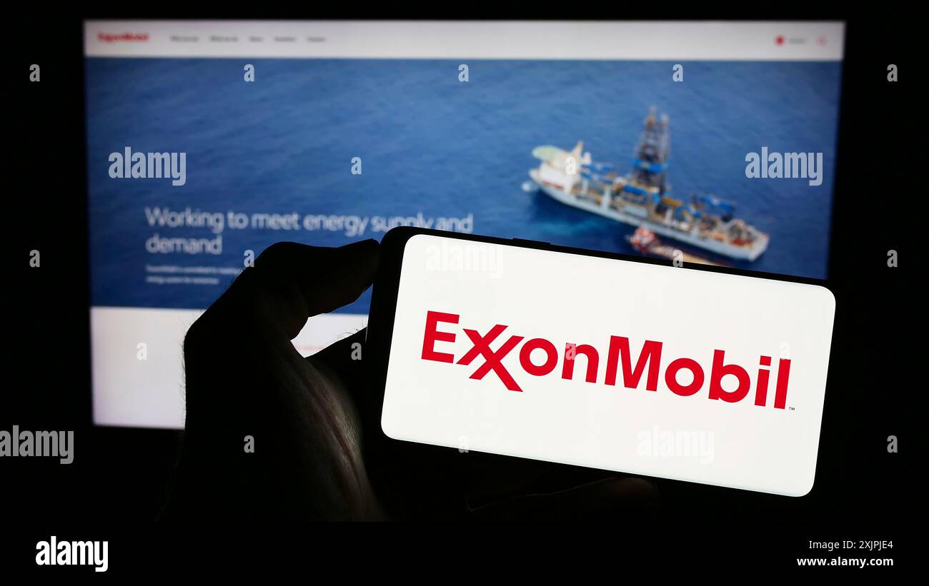 Stuttgart, Germany, 07-01-2023: Person holding cellphone with logo of ...