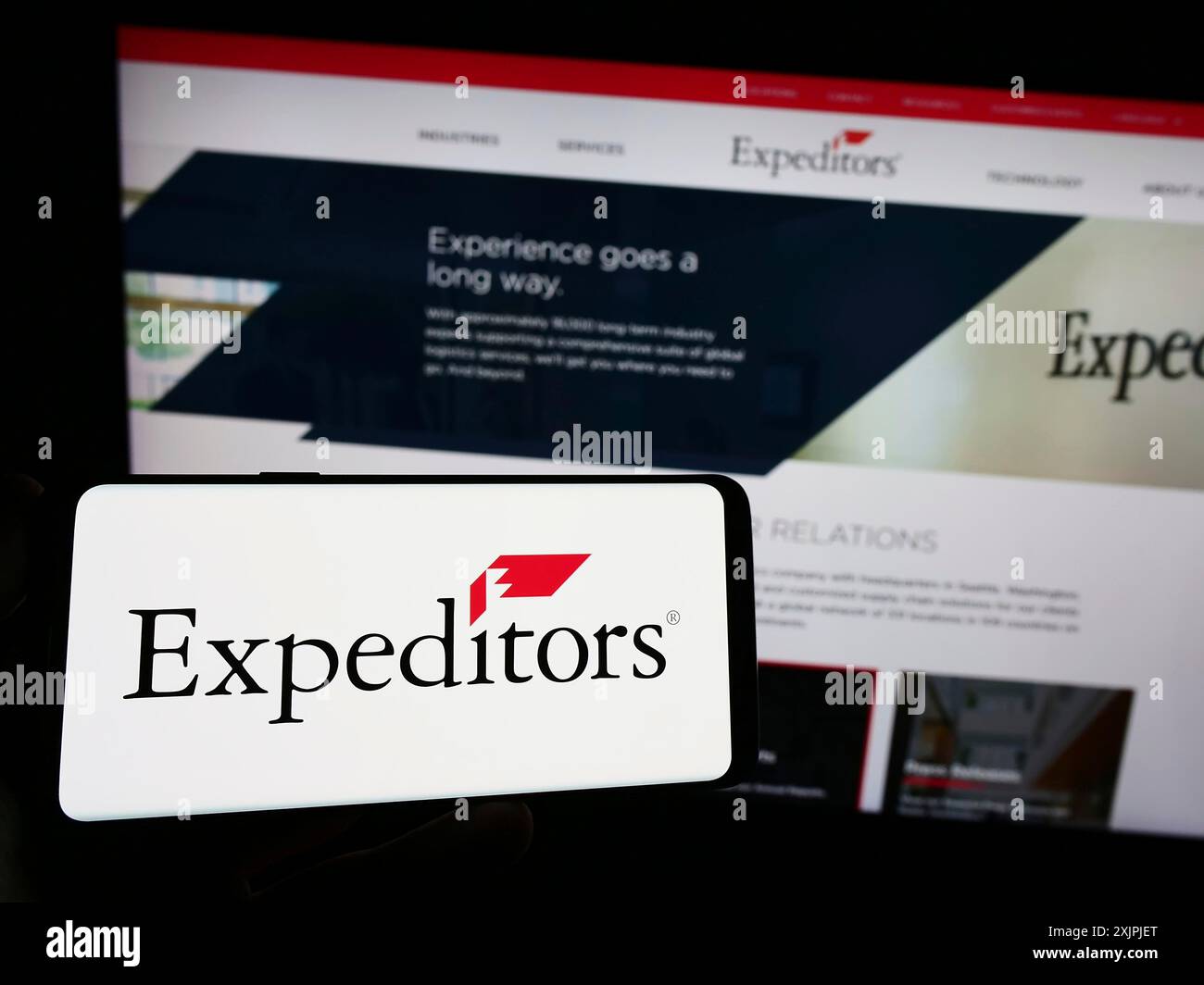 Stuttgart, Germany, 07-01-2023: Person holding smartphone with logo of ...