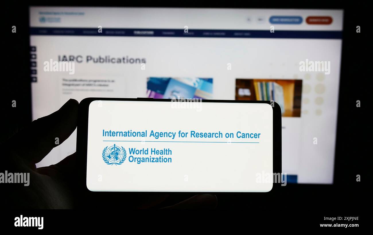 Stuttgart, Germany, 07-04-2023: Person holding smartphone with logo of ...