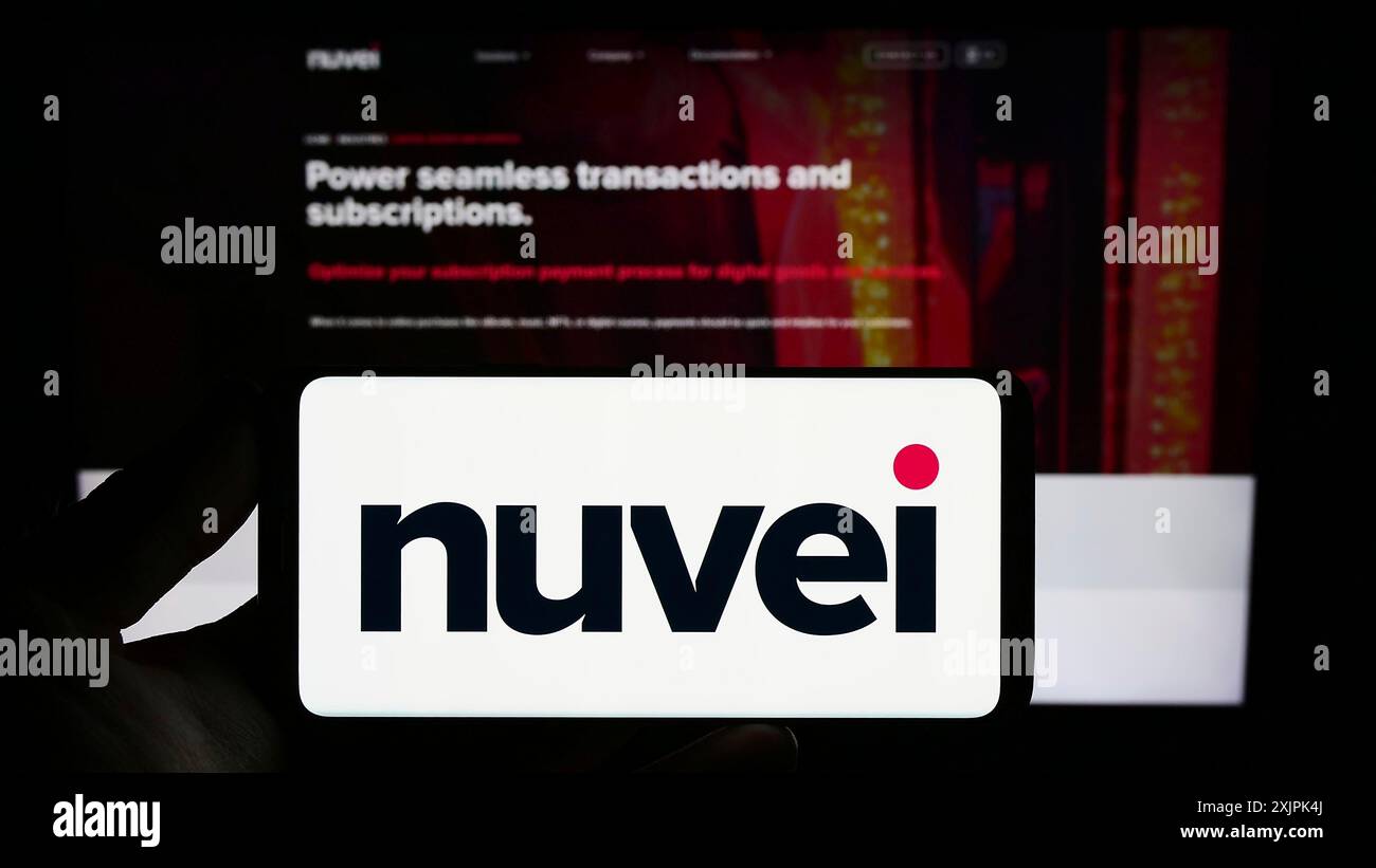 Stuttgart, Germany, 07-08-2023: Person holding smartphone with logo of ...