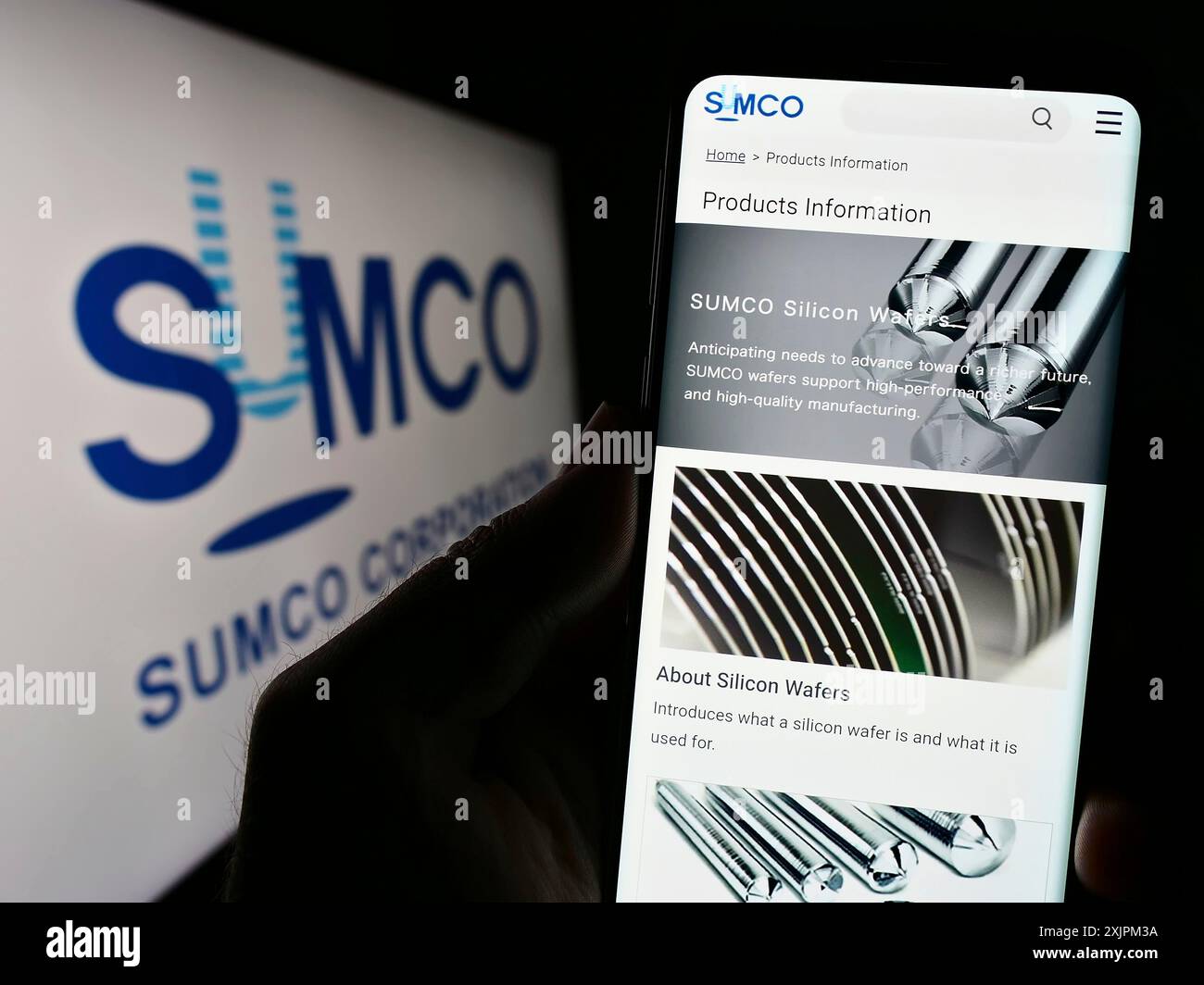 Stuttgart, Germany, 07-21-2023: Person holding cellphone with webpage of Japanese semiconductor ...