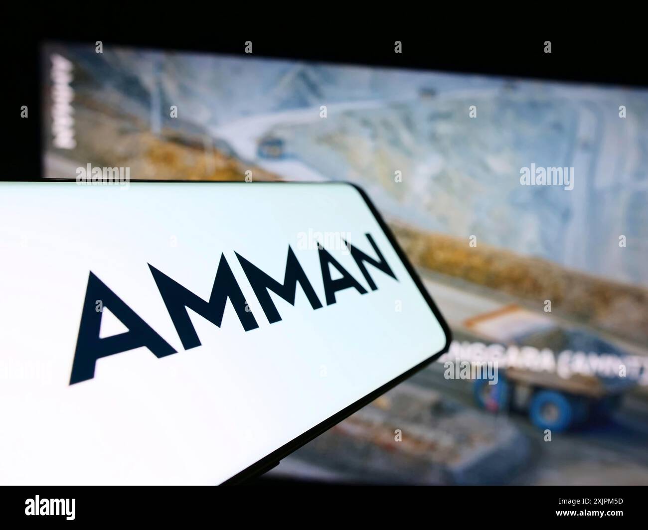 Stuttgart, Germany, 07-24-2023: Cellphone with logo of company PT Amman ...