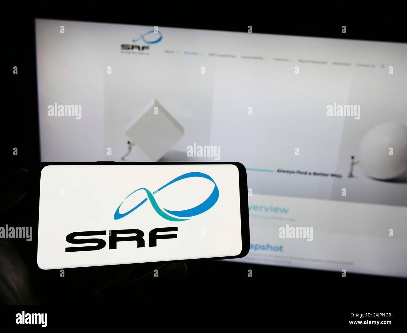 Stuttgart, Germany, 08-05-2023: Person holding mobile phone with logo ...