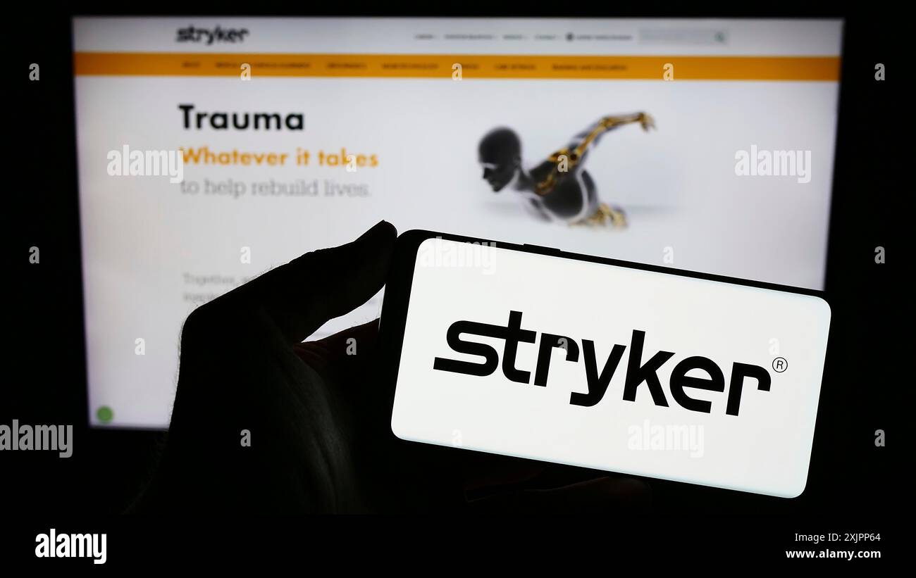 Stuttgart, Germany, 08-09-2023: Person holding smartphone with logo of ...