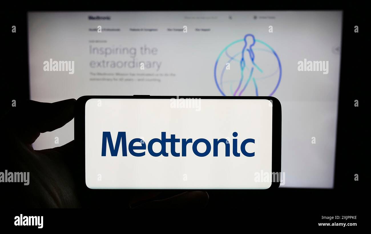 Stuttgart, Germany, 08-14-2023: Person holding cellphone with logo of ...