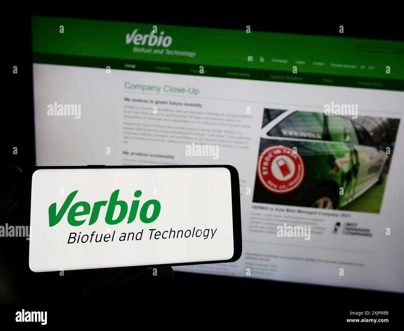 Stuttgart, Germany, 08-21-2023: Person holding smartphone with logo of biofuel company Verbio ...