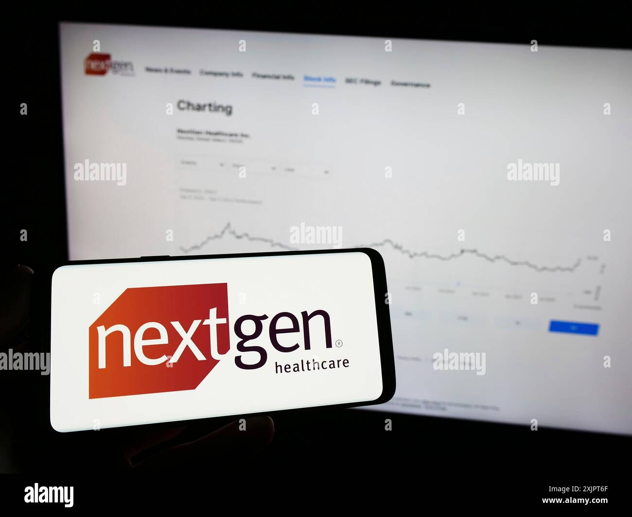 Stuttgart, Germany, 09-05-2023: Person holding mobile phone with logo of American software ...