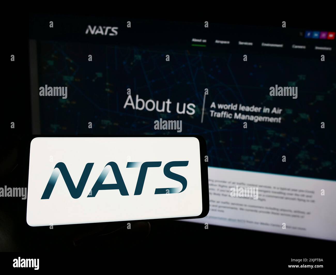 Stuttgart, Germany, 09-08-2023: Person holding smartphone with logo of ...