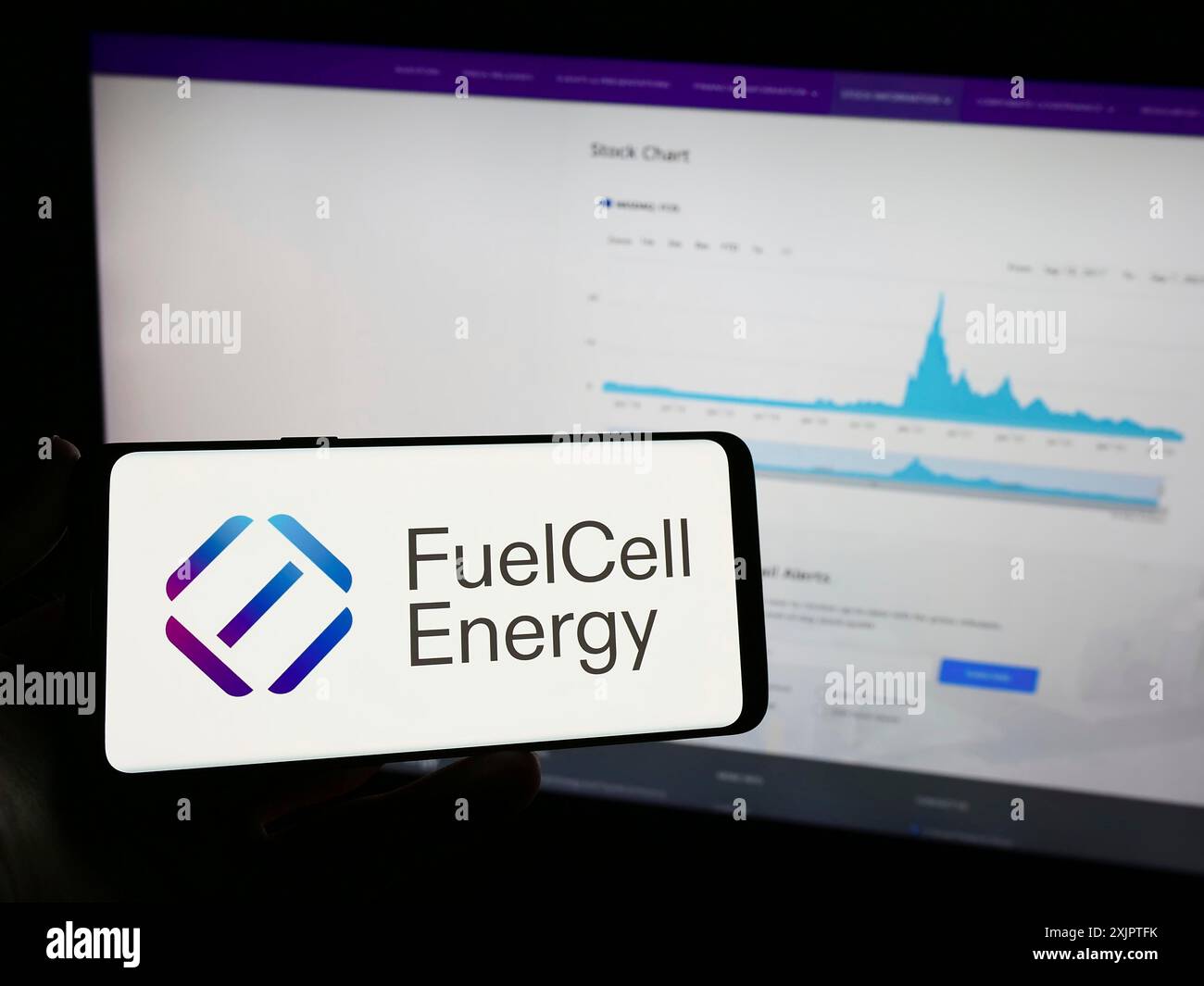 Stuttgart, Germany, 09-08-2023: Person holding mobile phone with logo ...
