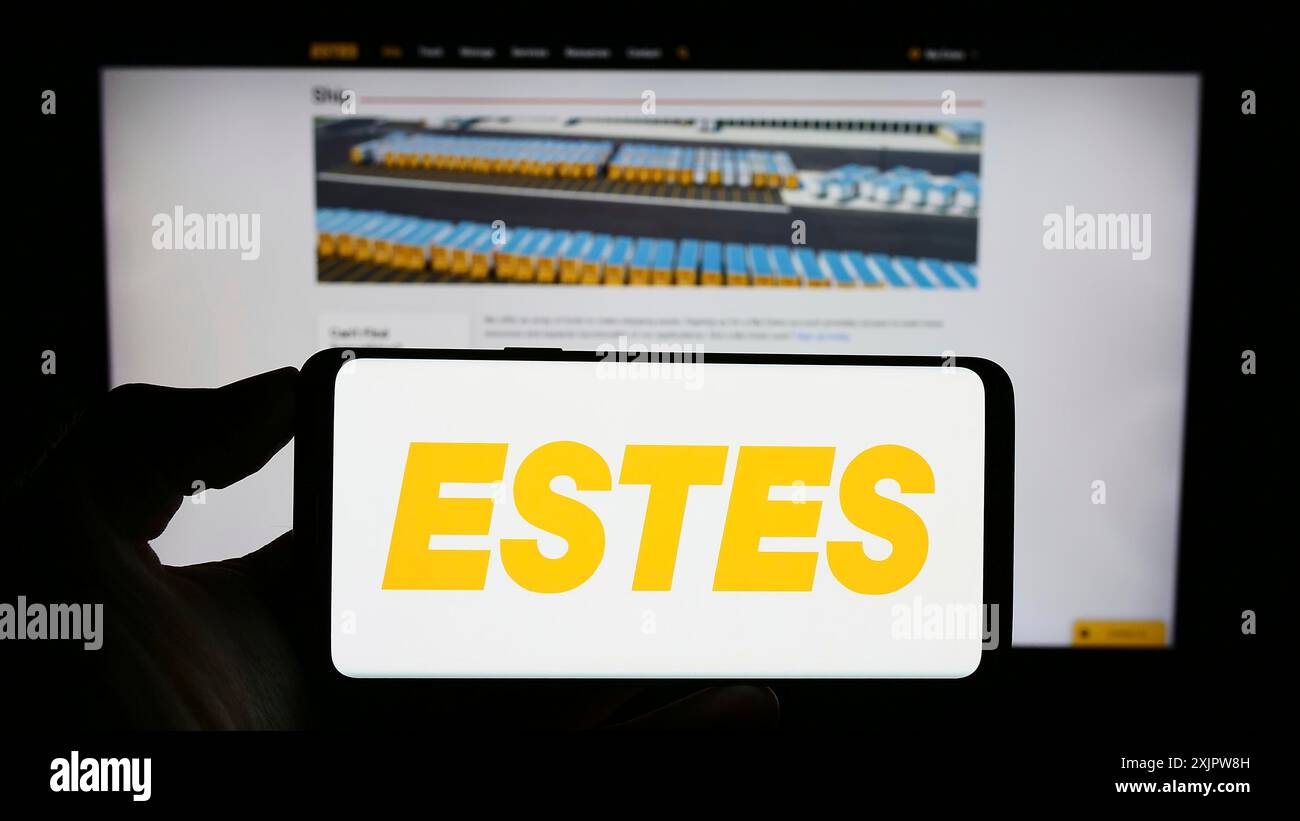 Stuttgart, Germany, 09-20-2023: Person holding mobile phone with logo ...