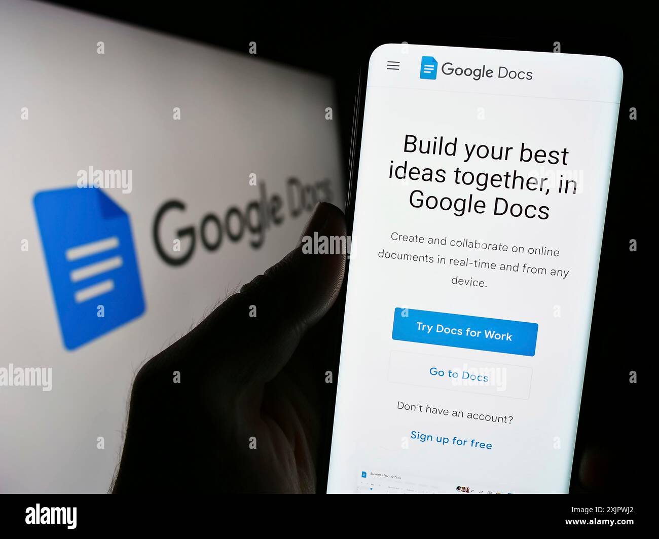 Stuttgart, Germany, 09-23-2023: Person holding cellphone with webpage of online word processing ...