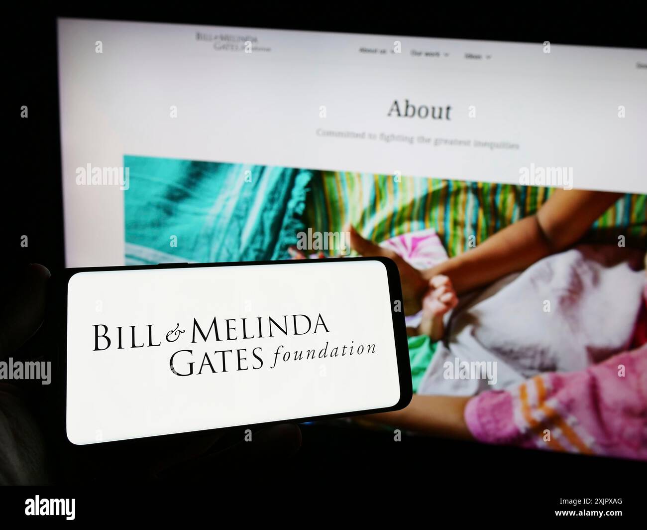 Stuttgart, Germany, 10-06-2023: Person holding mobile phone with logo ...