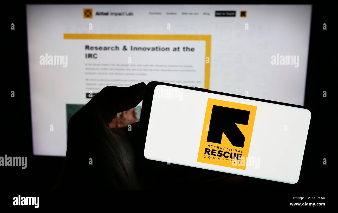 Stuttgart, Germany, 10-06-2023: Person holding mobile phone with logo ...