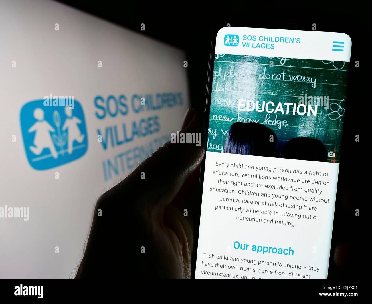 Stuttgart, Germany, 10-06-2023: Person holding cellphone with websote ...