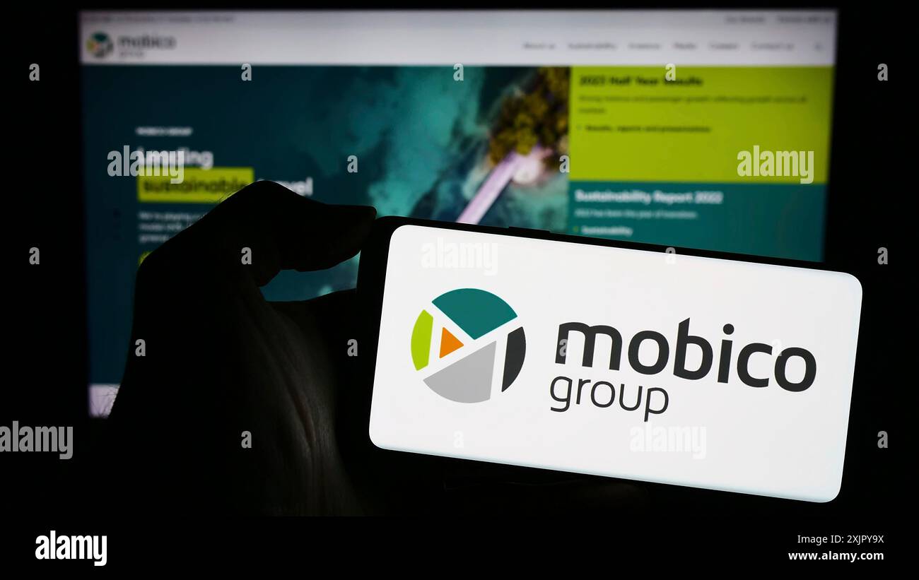 Stuttgart, Germany, 10-28-2023: Person holding cellphone with logo of ...