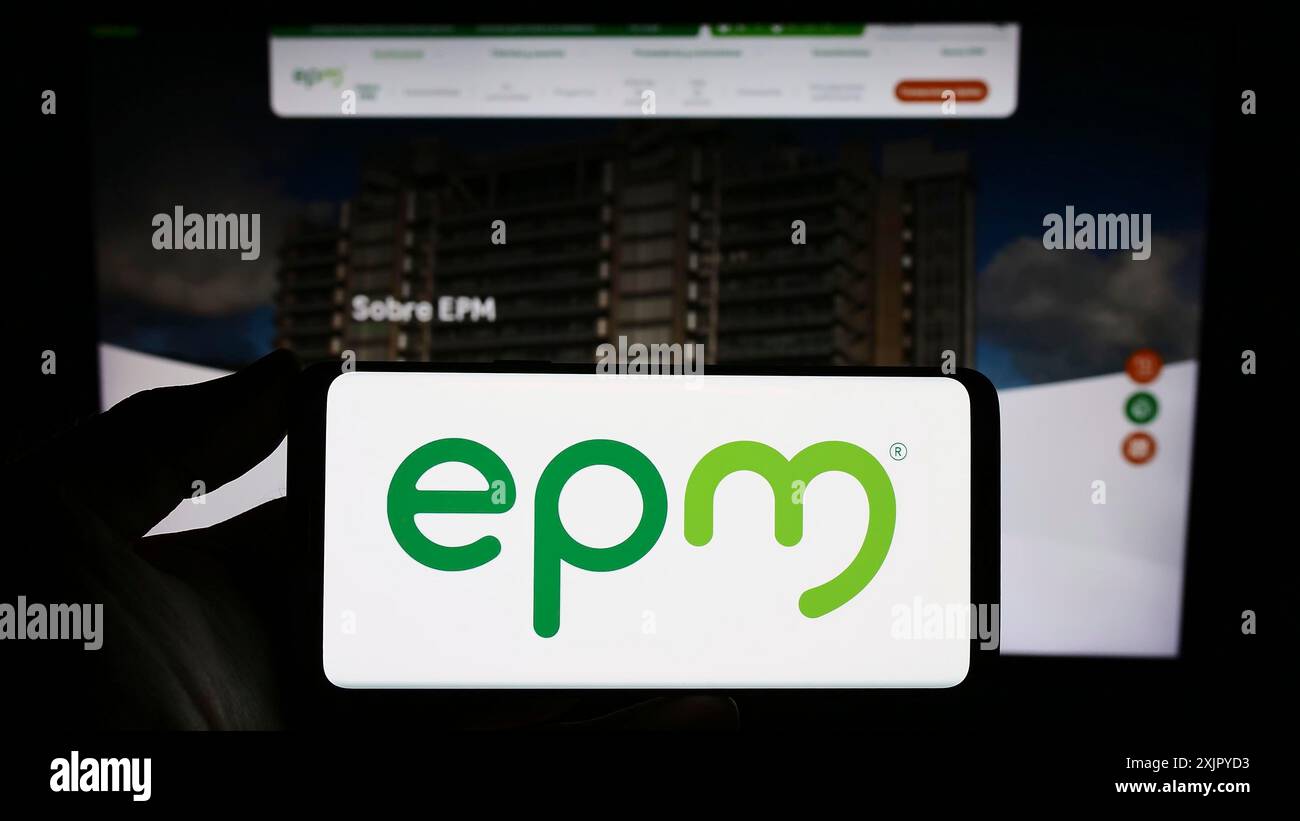 Stuttgart, Germany, 10-29-2023: Person holding smartphone with logo of Colombian company ...