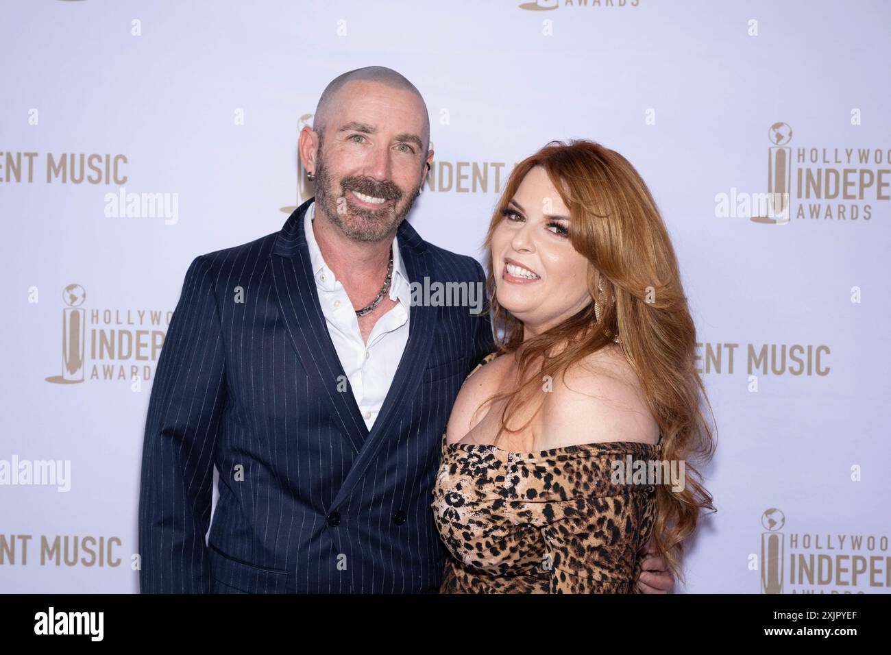 Los Angeles, USA. 18th July, 2024. Bass Player Derek Frank with wife ...