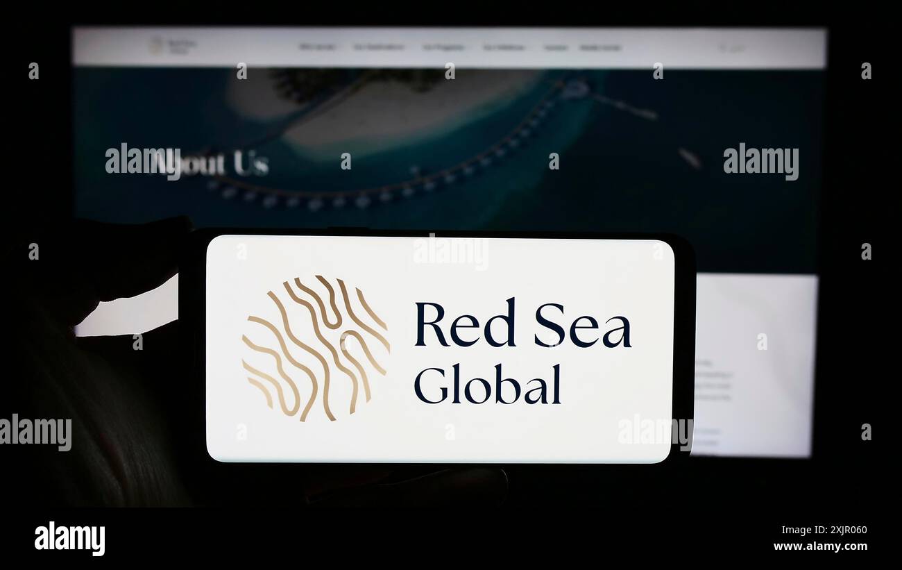 Stuttgart, Germany, 11-03-2023: Person holding smartphone with logo of ...