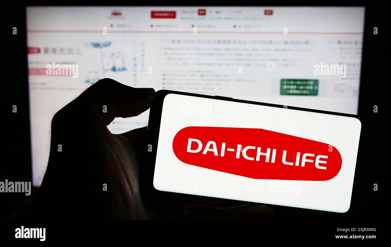 Stuttgart, Germany, 11-11-2023: Person holding cellphone with logo of ...