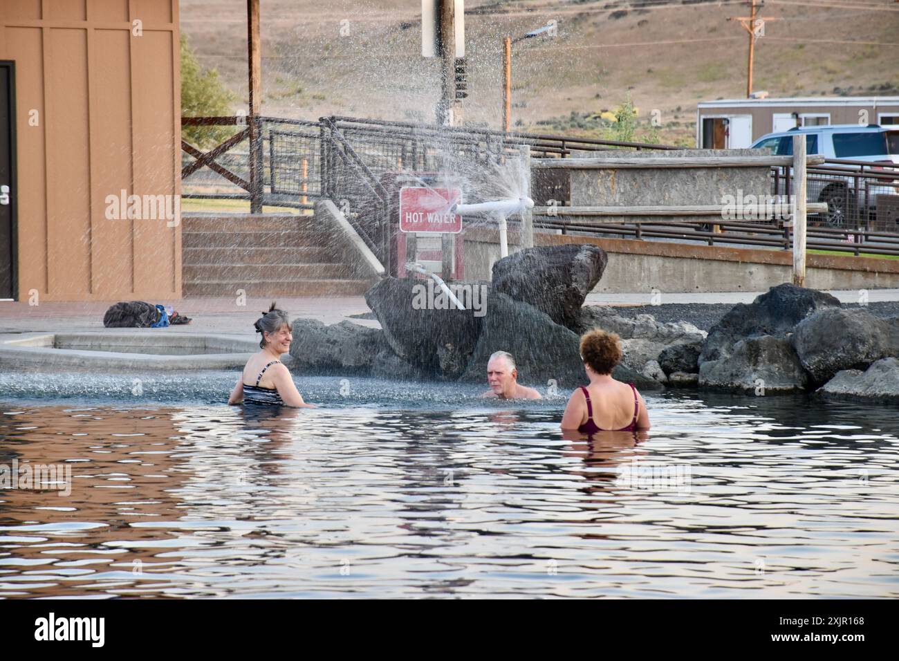 Older adult bathers soak in the main pool at Crystal Crane Hot Springs ...