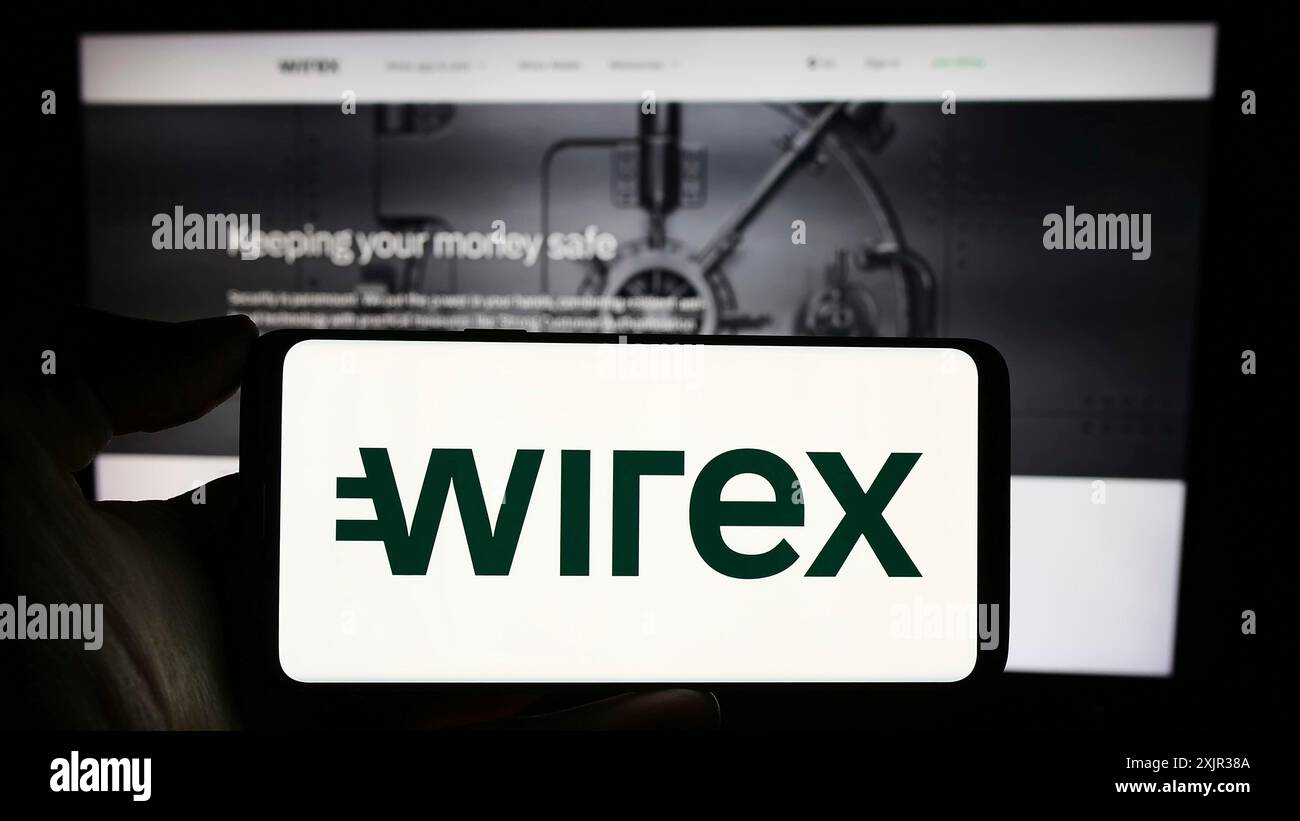 Stuttgart, Germany, 12-18-2023: Person holding cellphone with logo of ...