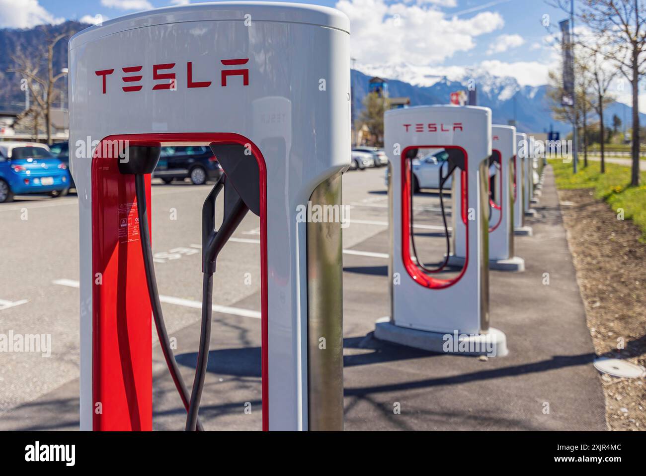 Tesla Superchargers on a parking lot Stock Photo - Alamy