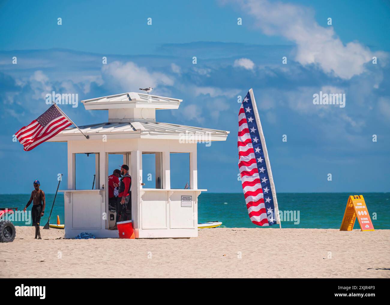White lifeguard station on South Beach with american flags Stock Photo ...