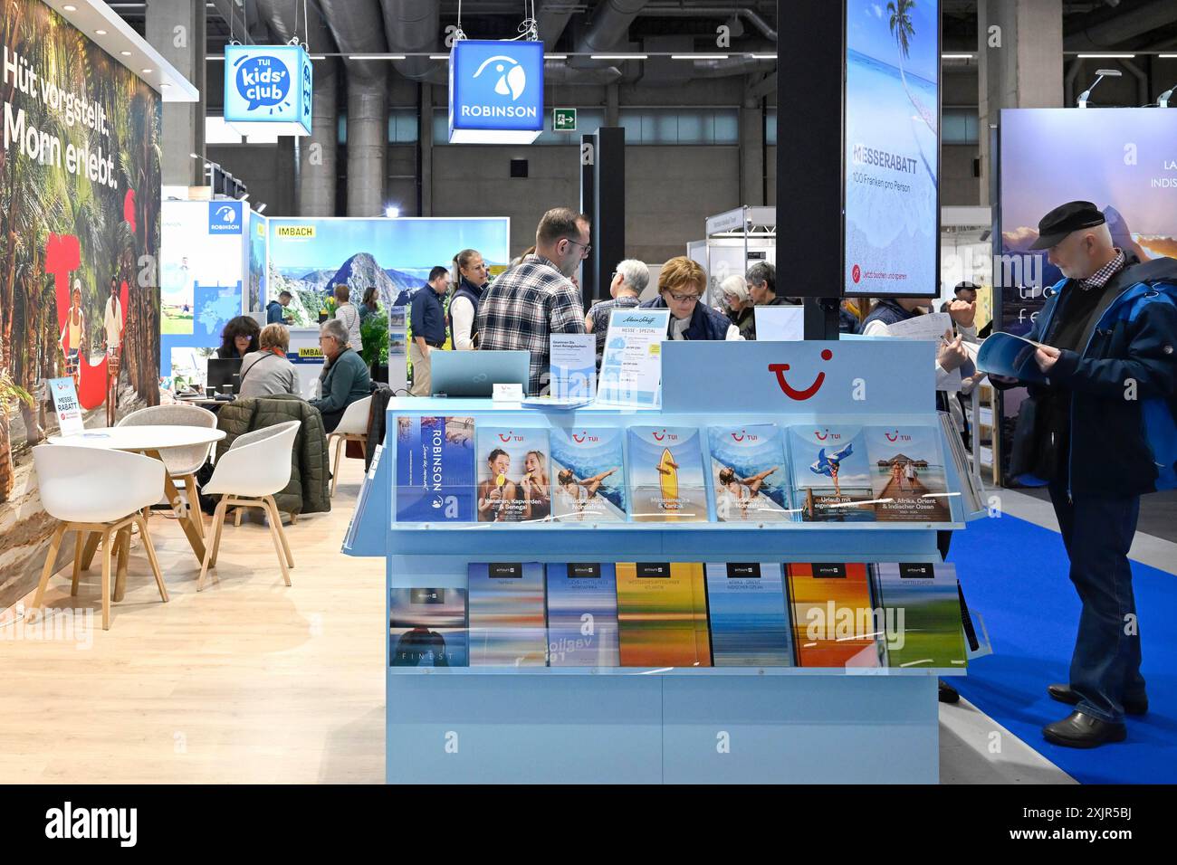 Exhibition stand Tui brochures Stock Photo - Alamy