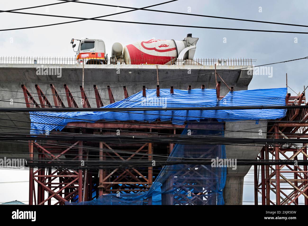 Road construction lorry road concrete pillar Stock Photo - Alamy