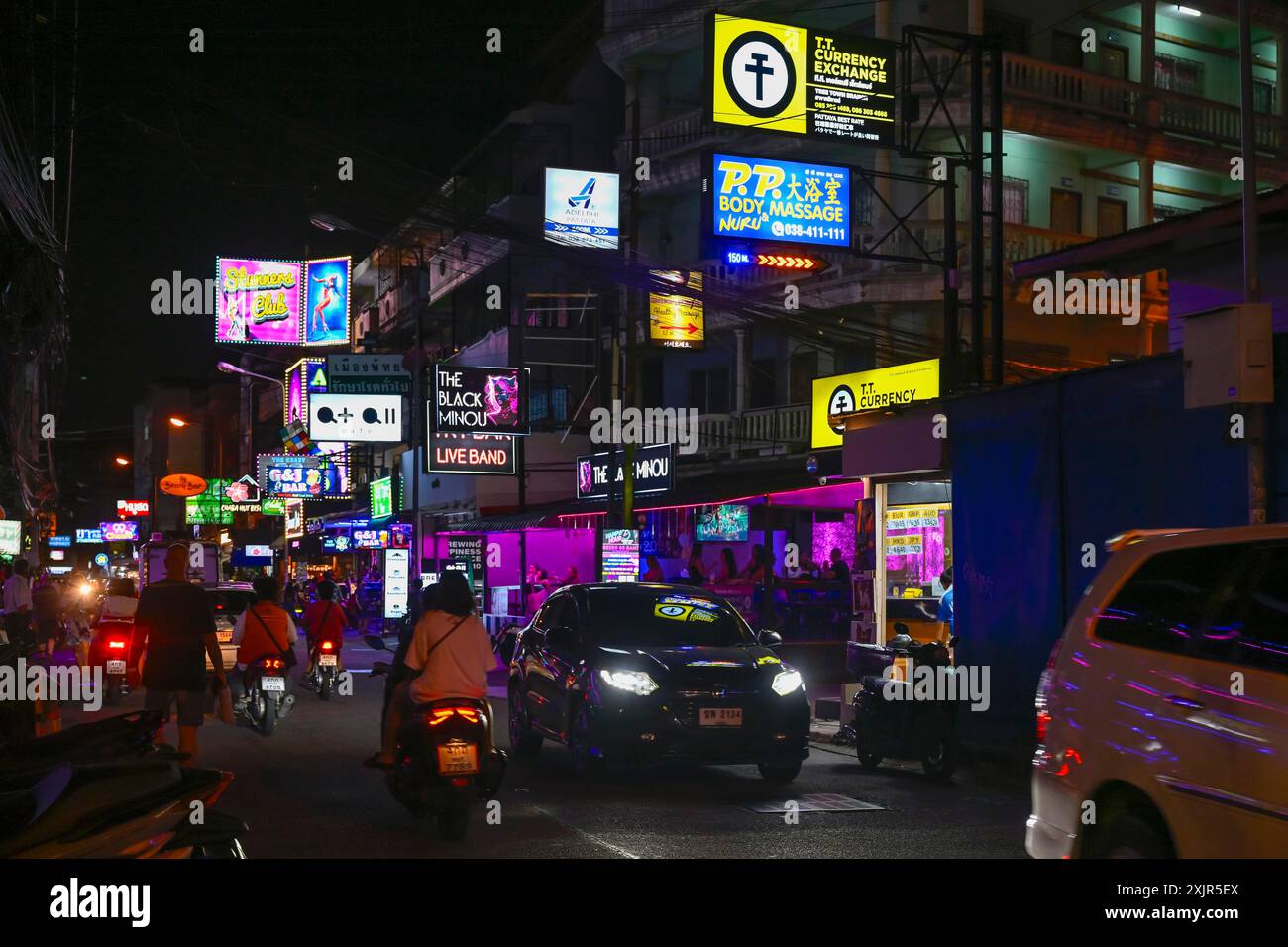 Nightlife illuminated signs Stock Photo - Alamy