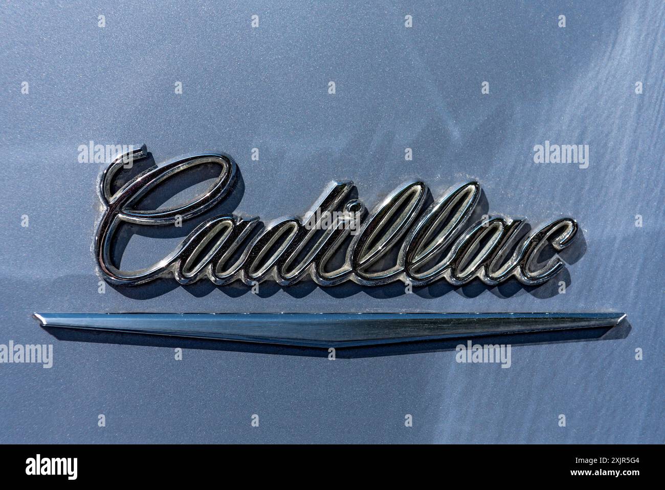 Lettering brand name Cadillac on vintage car Coupe DeVille at the rear ...