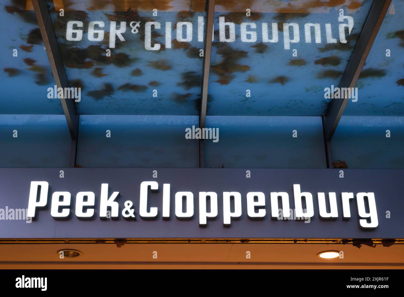 Peek & Cloppenburg, facade with sign and logo, illuminated, reflection ...