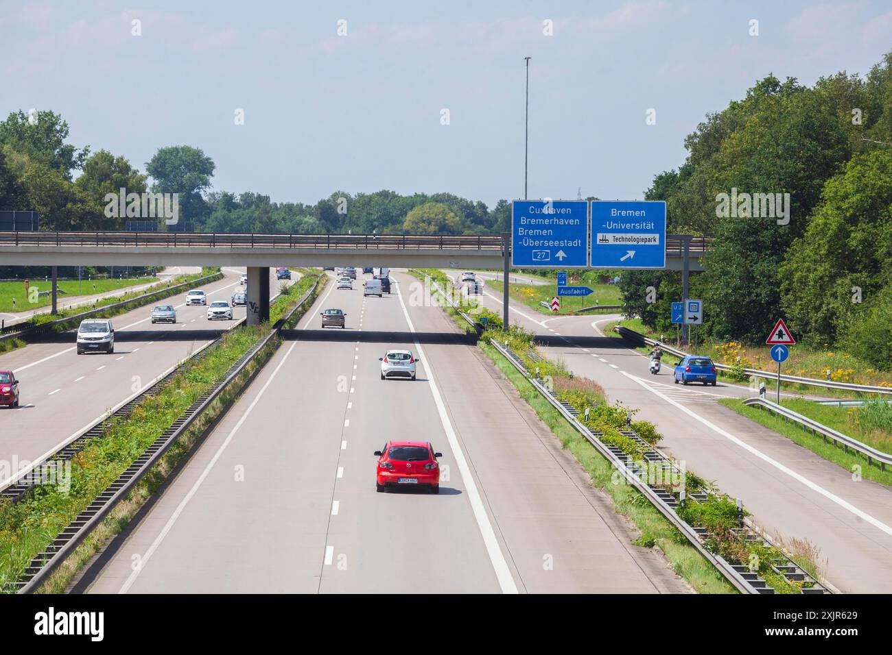 Motorway with road bridge and traffic signs, Bremen, Germany Stock ...
